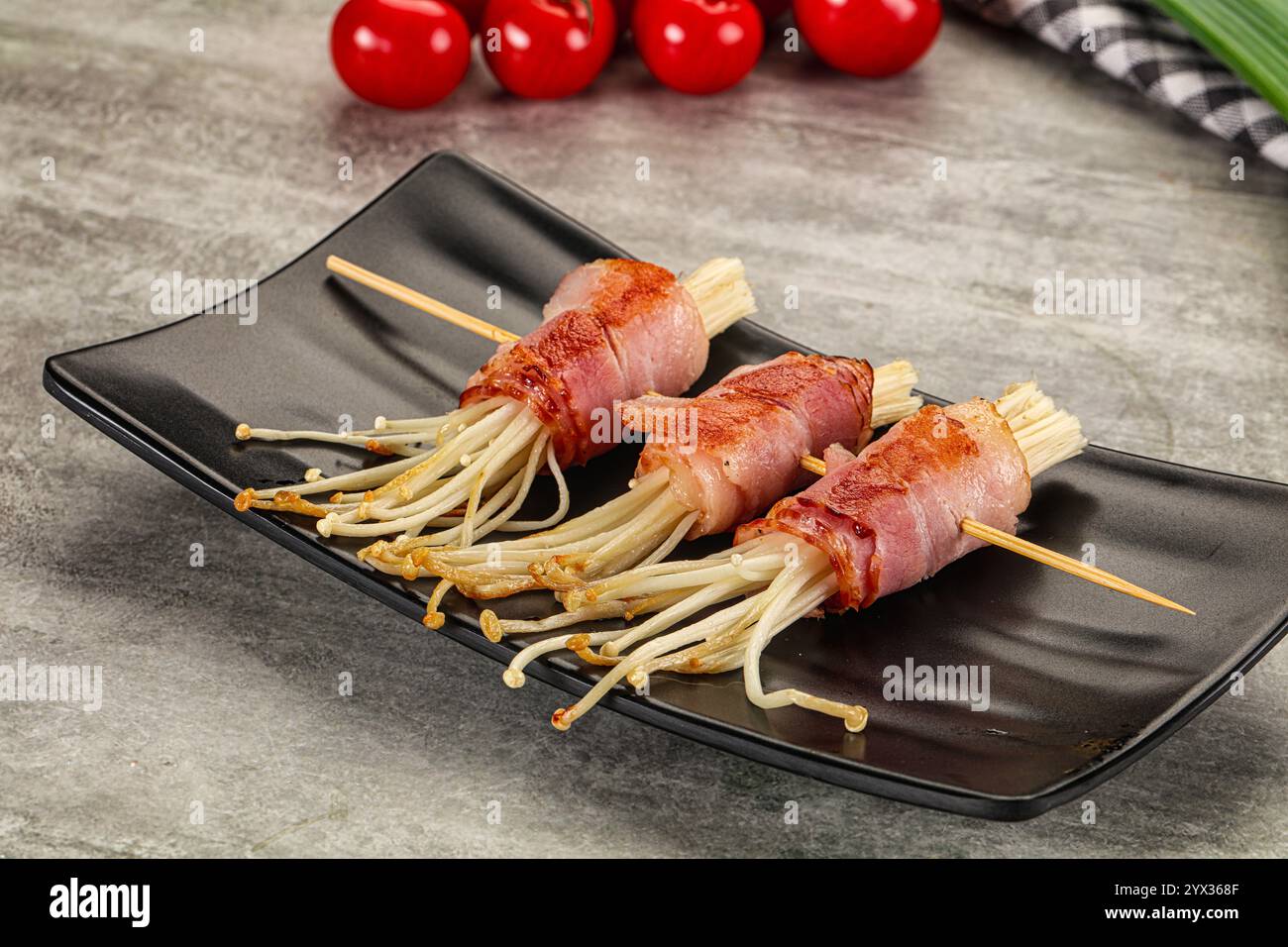Grilled enoki mushroom with bacon roll wrap Stock Photo - Alamy