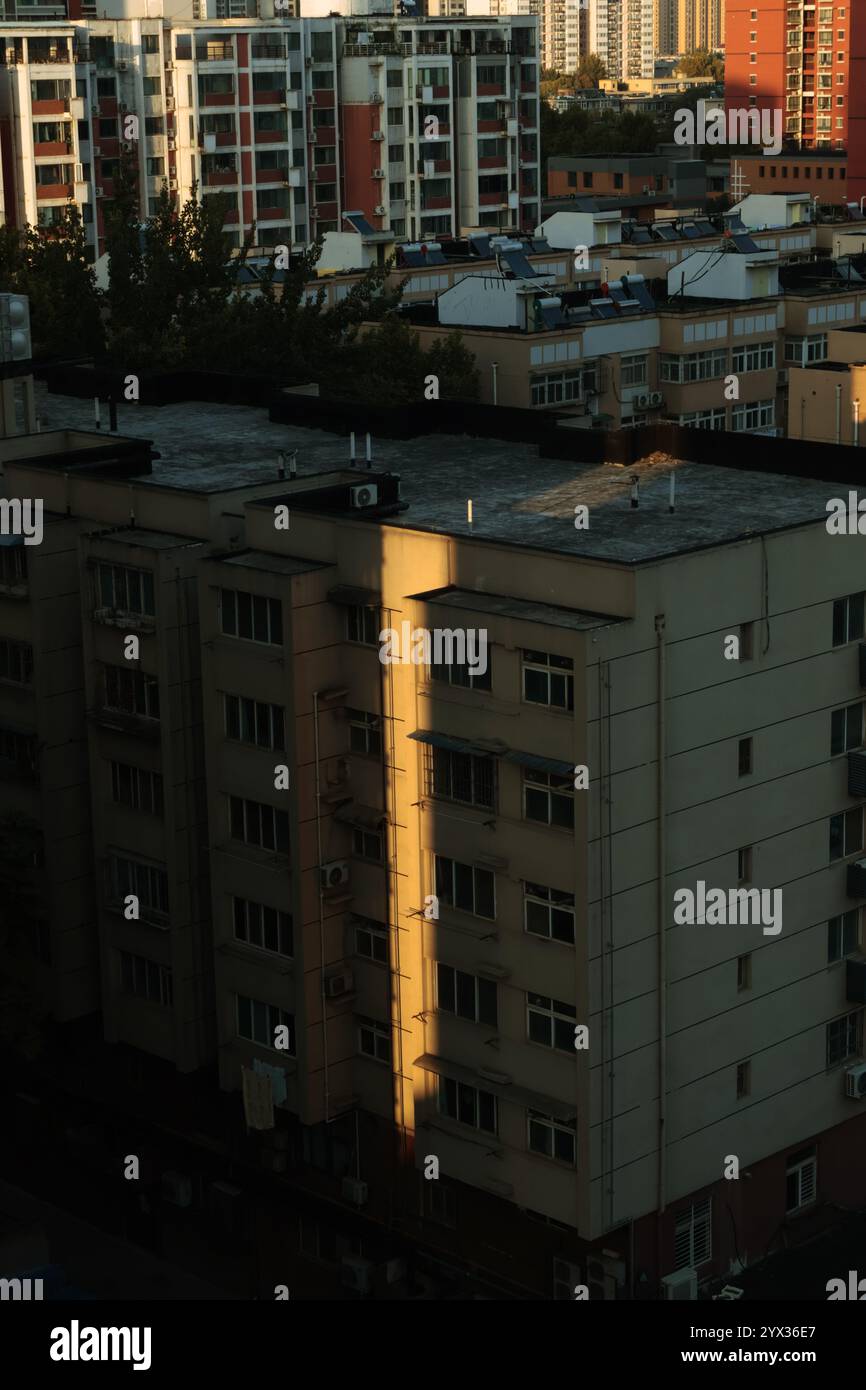 Shot from above of an apartment building with a beam of light in Xi'an ...