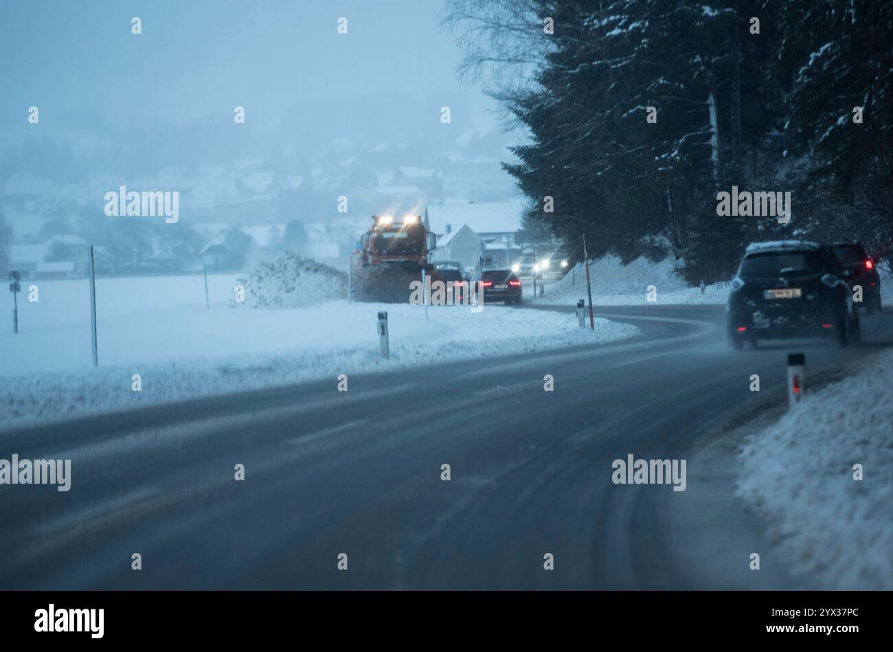 snowplow on country road, snow clearing vehicle in winter service snow ...