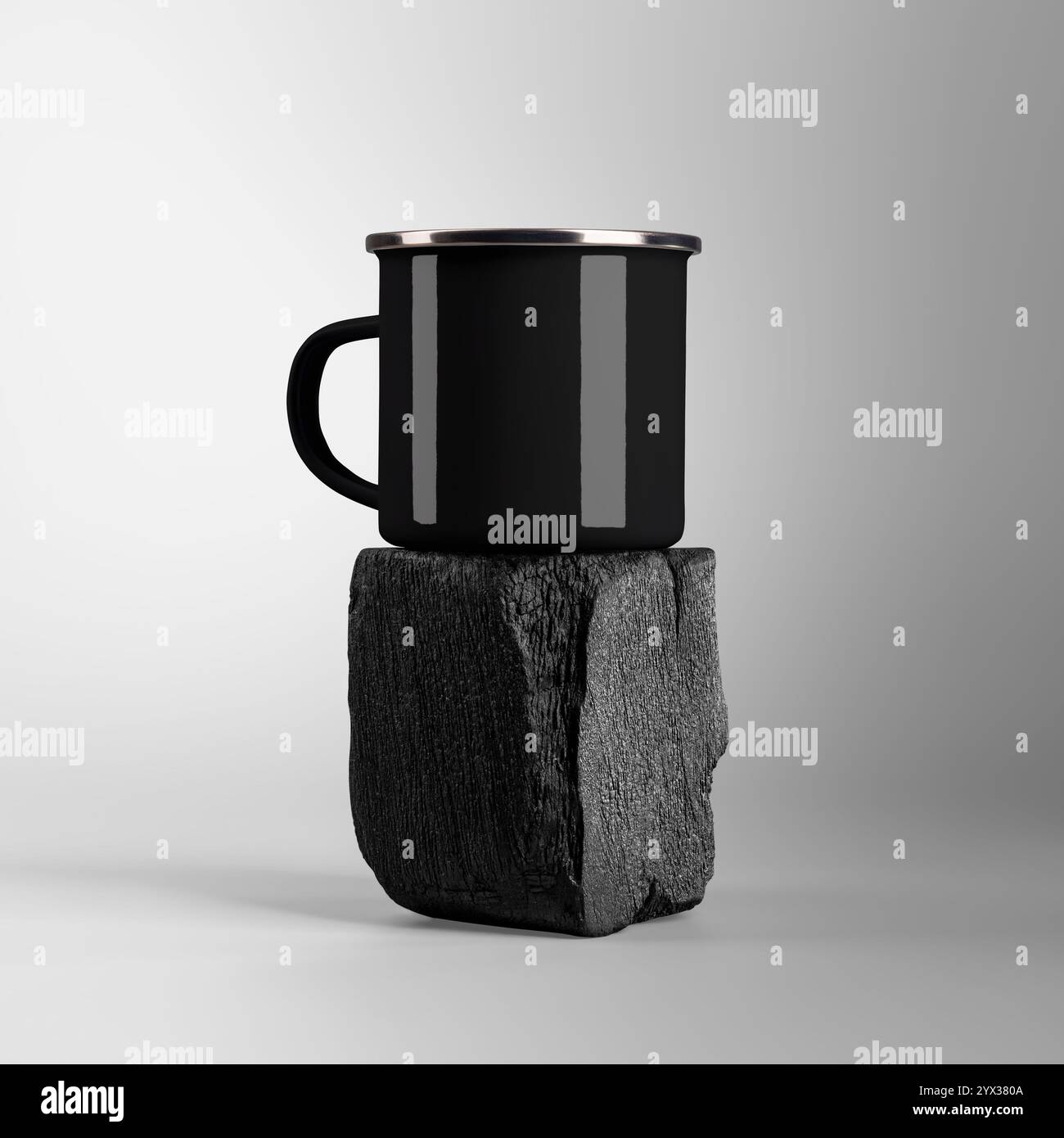 Mockup of black metal mug with chrome rim, handle, on burnt wooden beam ...