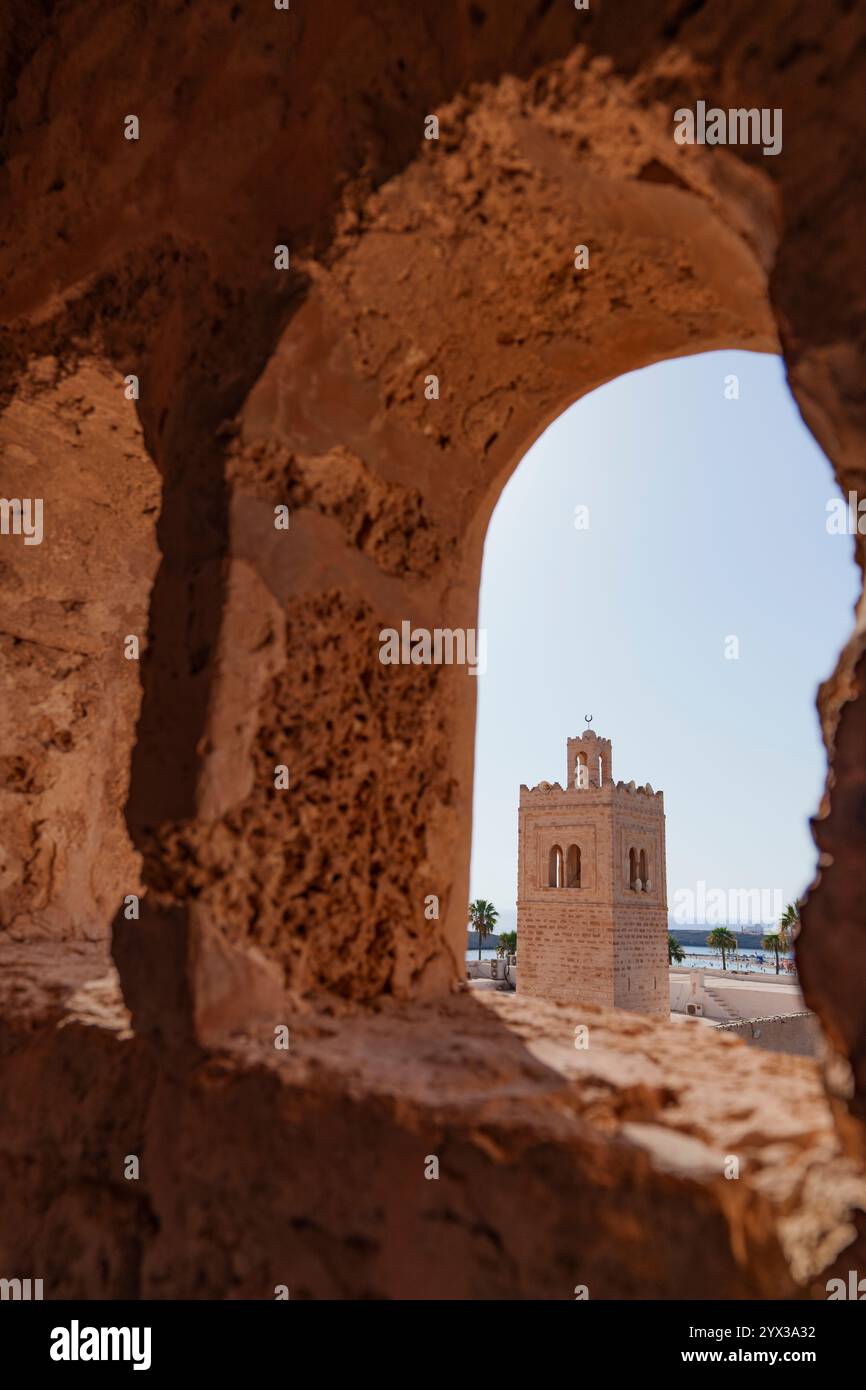 View through the open stone windows onto the historic buildings Stock ...