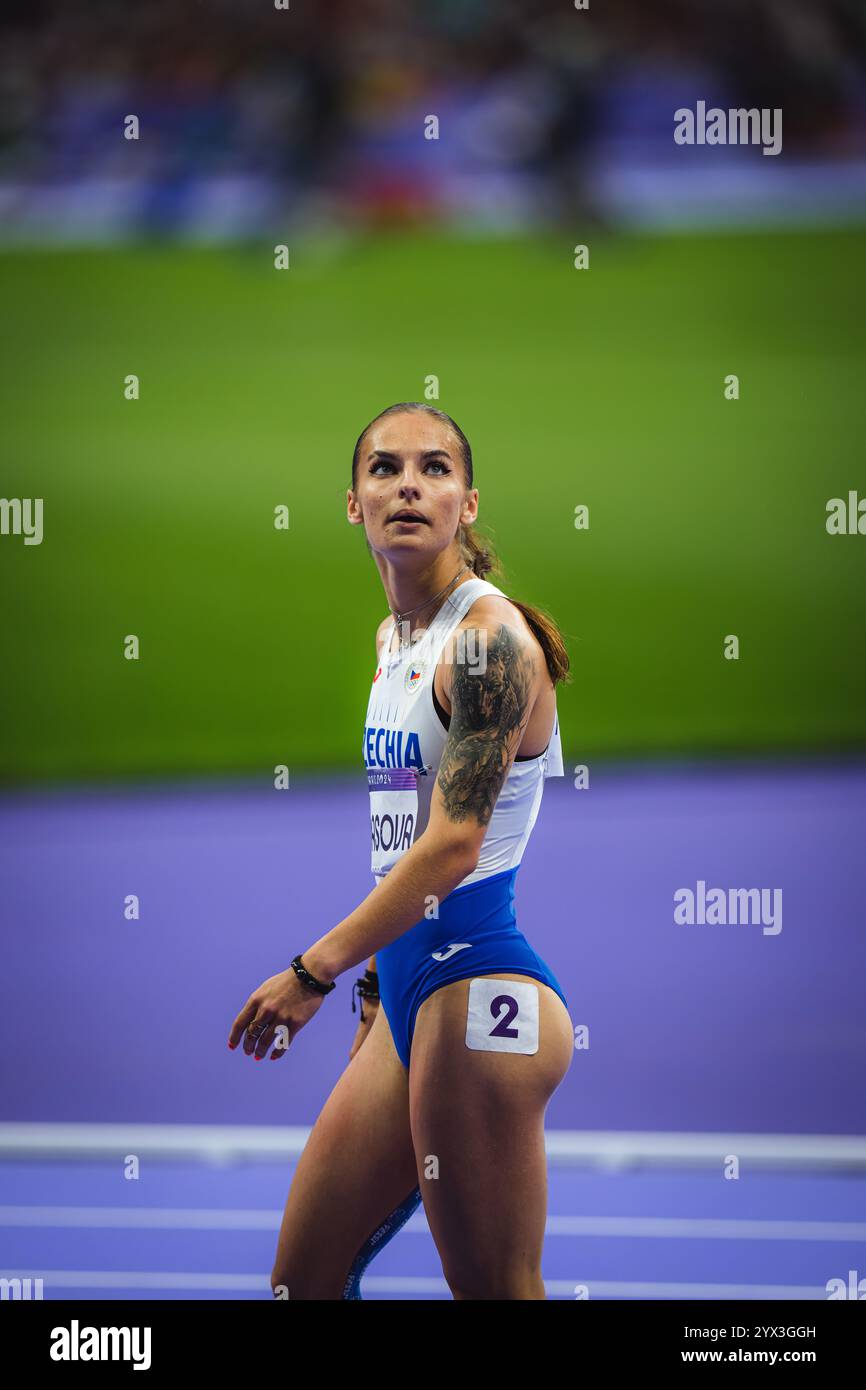 Karolína Maňasová participating in the 100 meters at the Paris 2024 ...