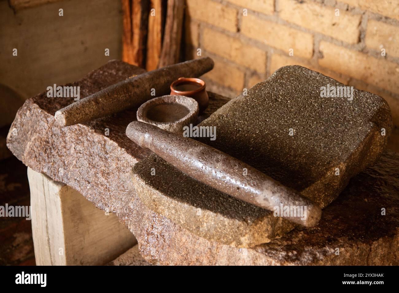 The Mexican stone metate in Oaxaca is an ancient stone tool for ...