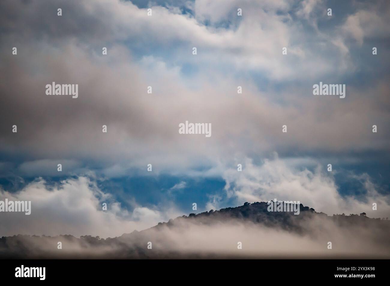 Hill ridge between clouds from Villajoyosa Stock Photo - Alamy