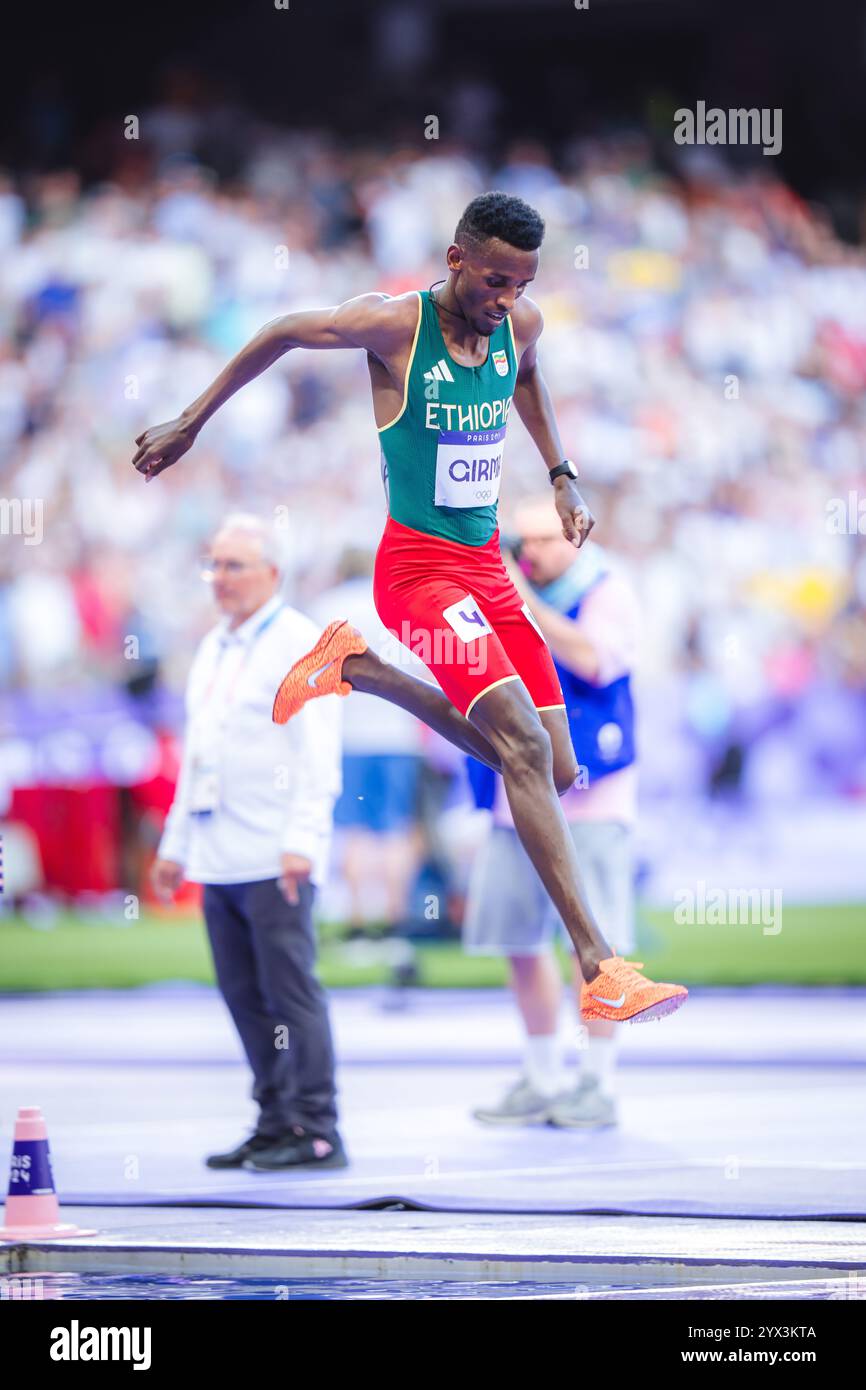 Lamecha Girma participating in the 3000 metres steeplechase at the ...