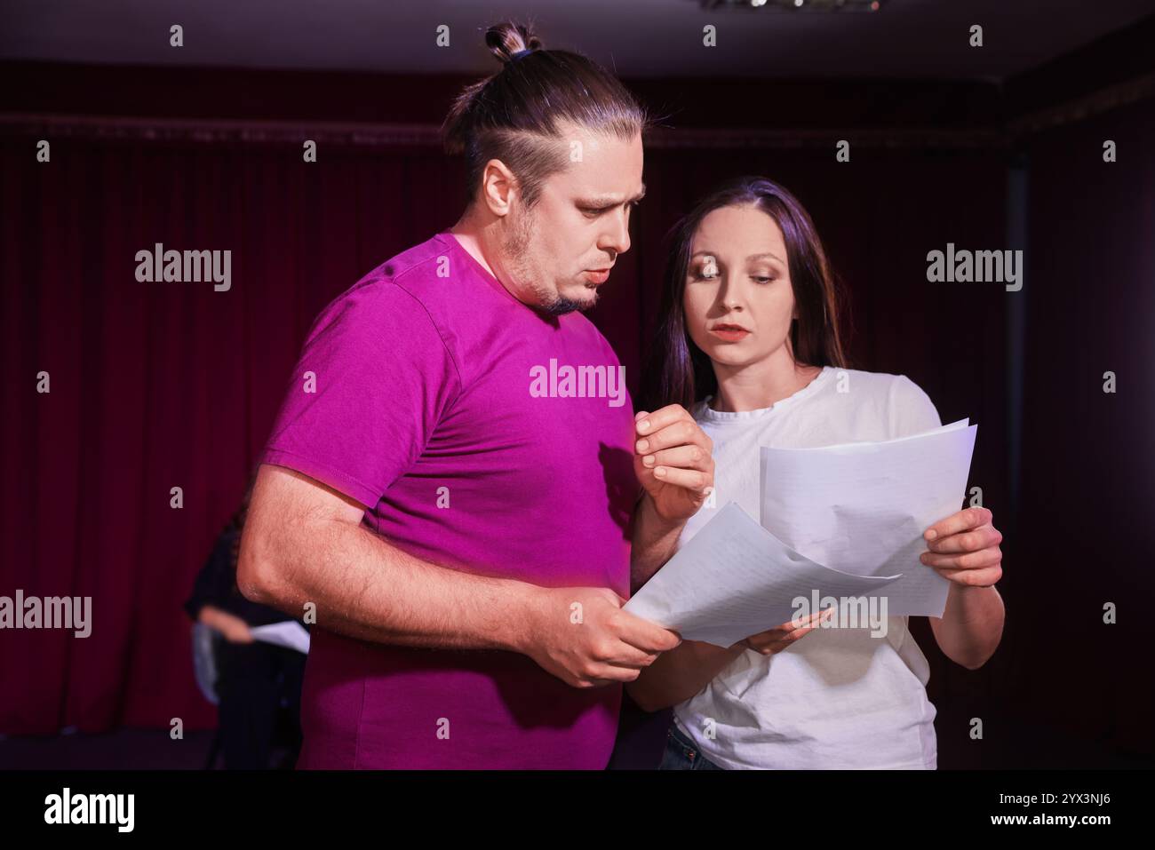 Professional actors rehearsing on stage in theatre Stock Photo - Alamy