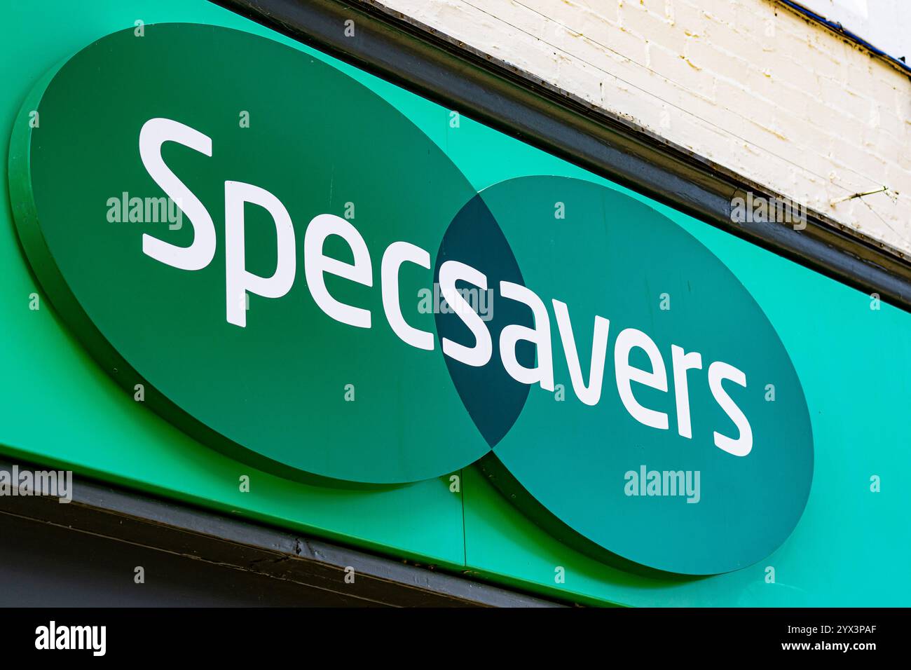 Close up view of a Specsavers sign on the front of a UK city centre ...