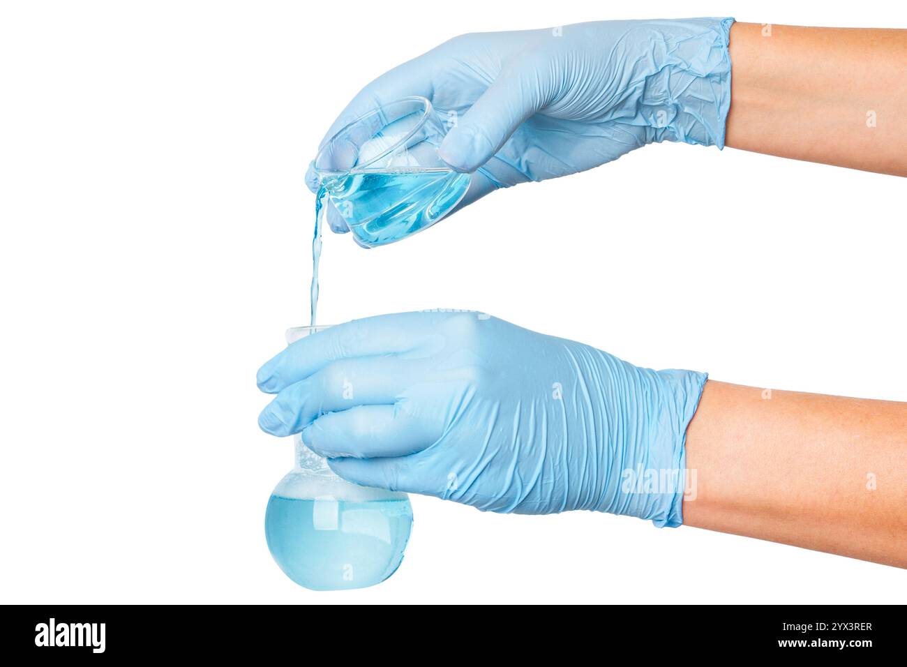 Hand in medical gloves pouring blue liquid from a flask on an empty background. Laboratory ...