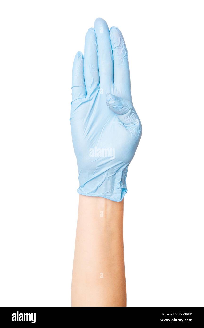Hand in medical gloves showing the number four or an open palm with a ...