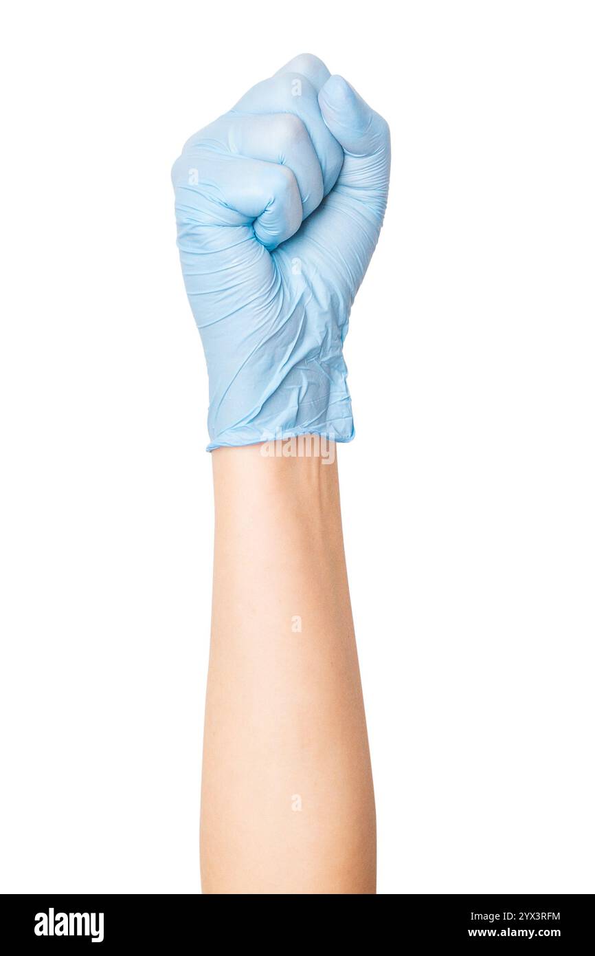 Hand in medical gloves making a fist on an empty background. Strength ...