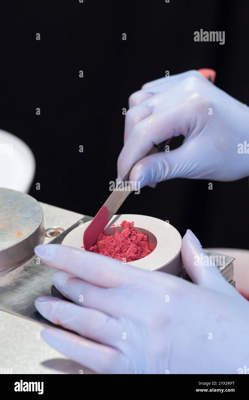 Woman glove work factory hi-res stock photography and images - Alamy