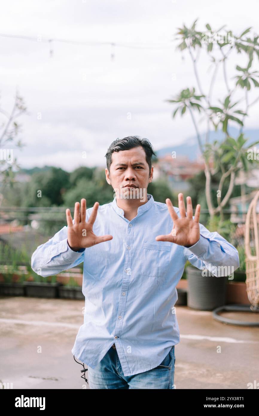 Serious waving hi-res stock photography and images - Alamy