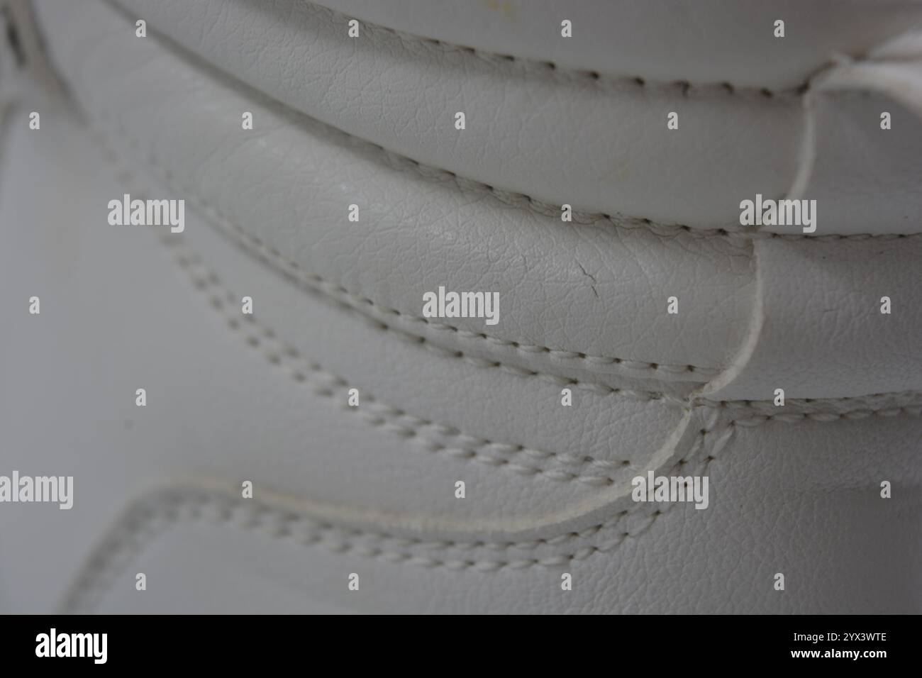 Fabric background, material made of white leatherette, plastic, rubber ...