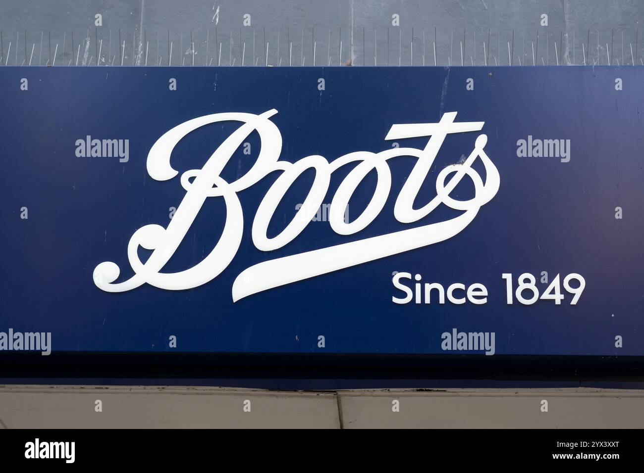 Close up Boots storefront signage above UK city centre branch; the sign ...