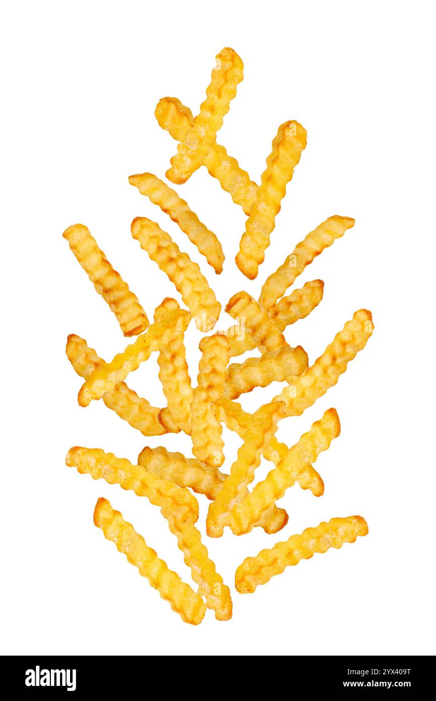 Lots of flying ribbed french fries on a blank background Stock Photo ...