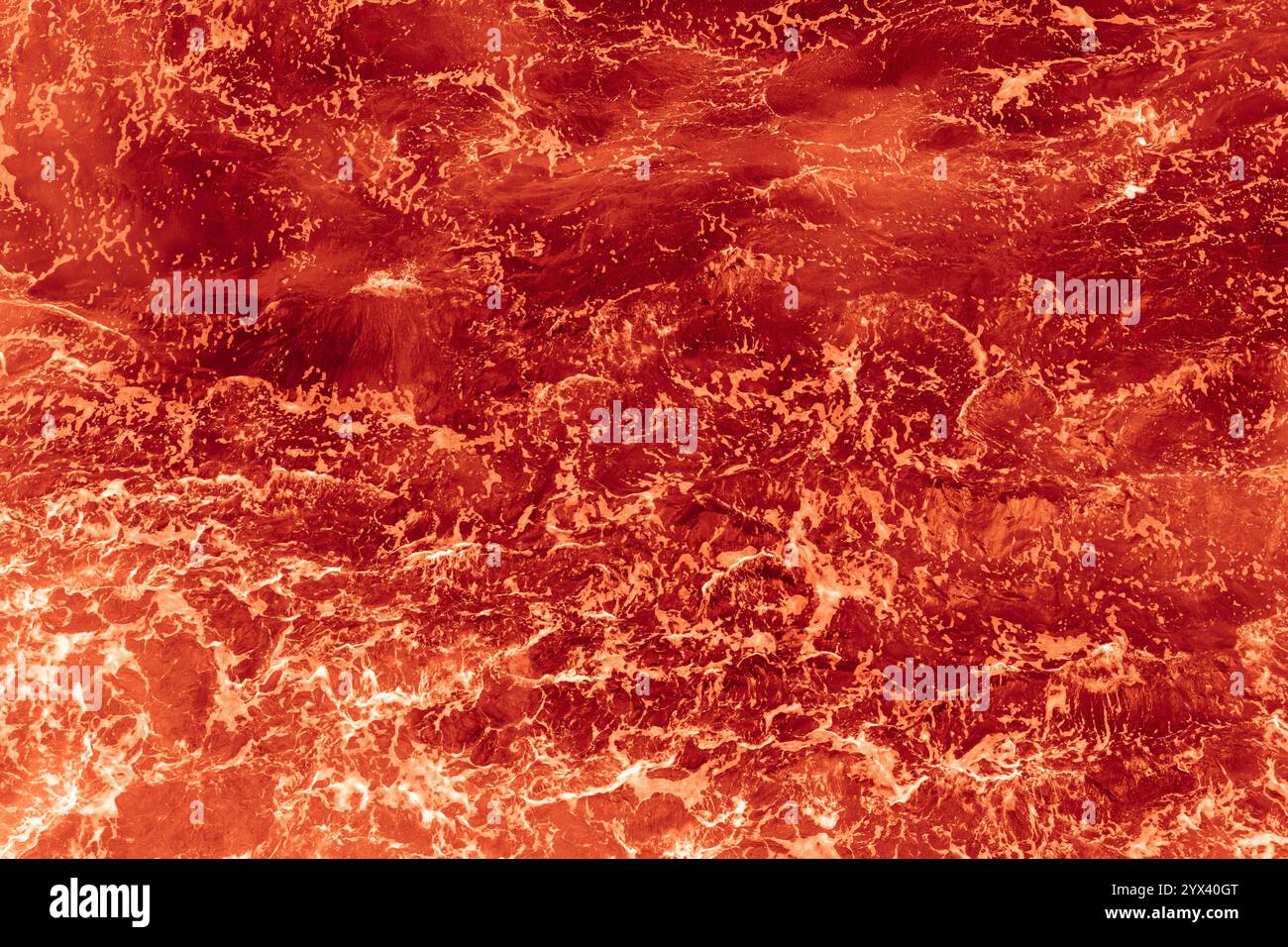 Fiery Waves of Creation: The Dance of Molten Lava Stock Photo - Alamy