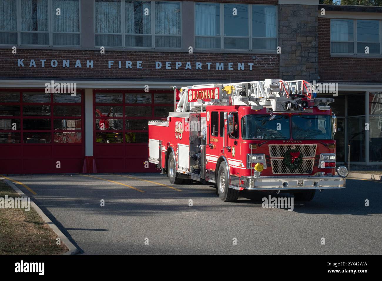 A fire engine exiting the station in Katonah, Westchester, New York. It ...