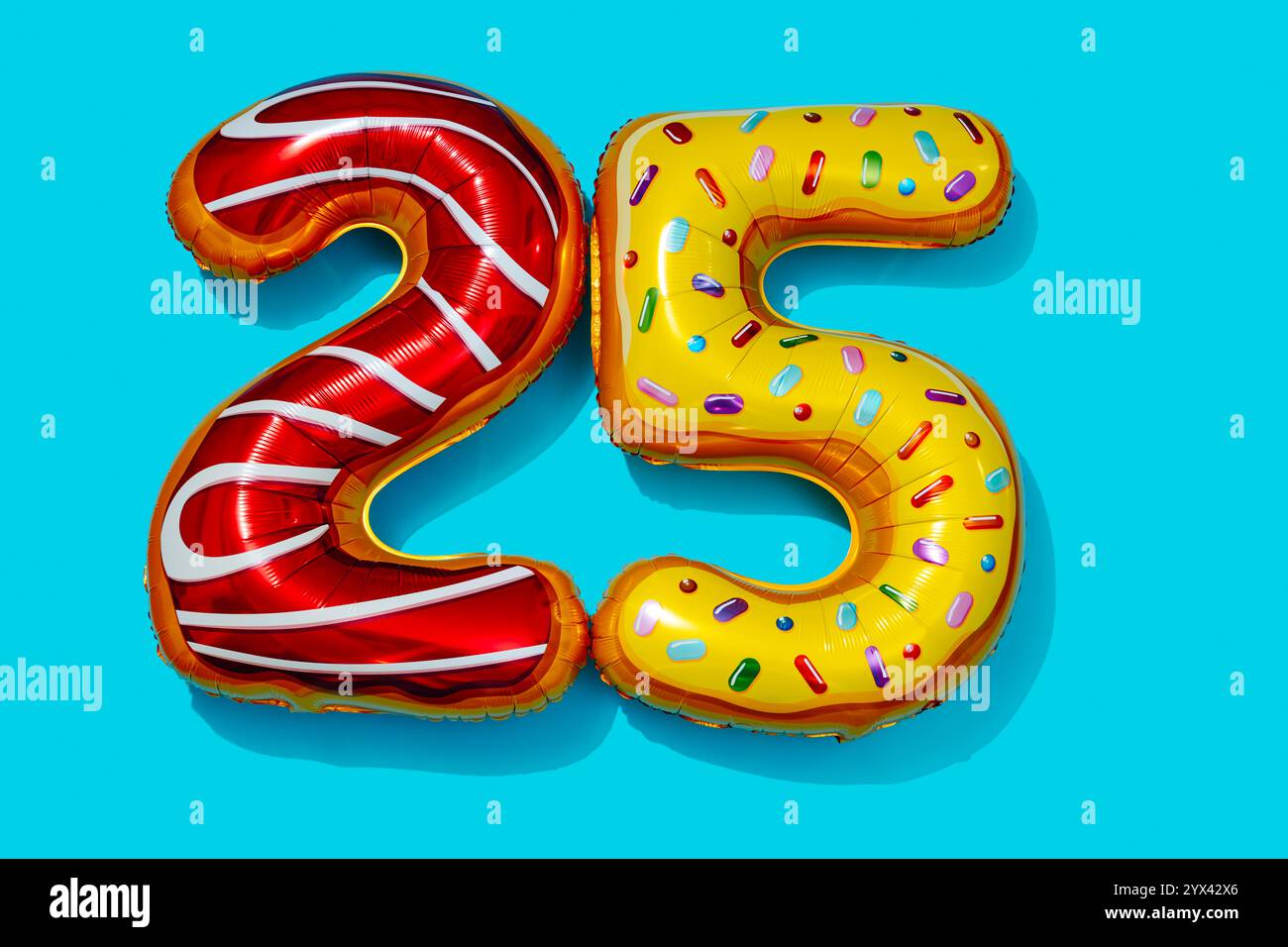 two foil balloons of different colors and patterns forming the number ...