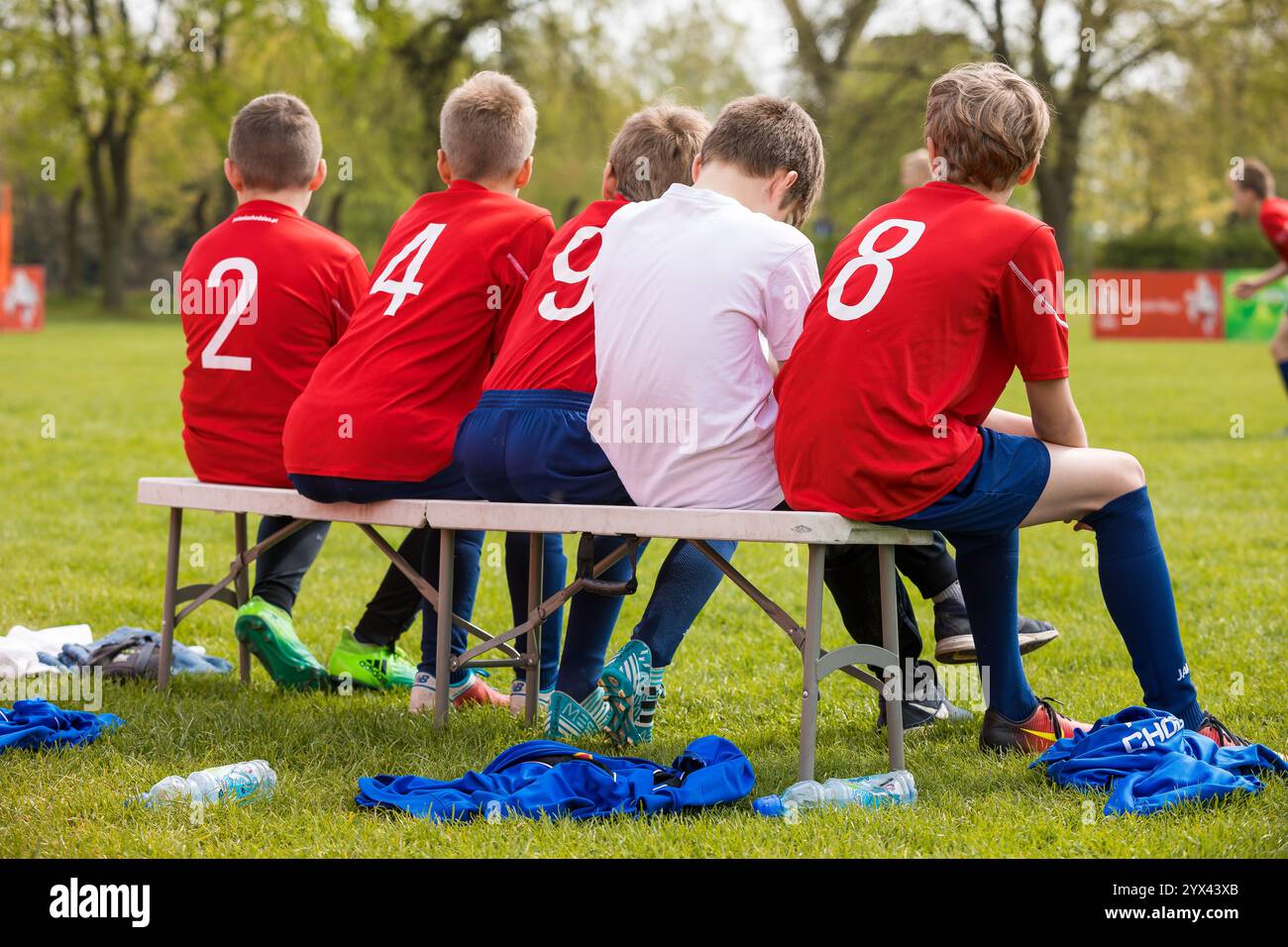 Kids in the Sports Team on Substitute Bench. Young Football Players ...