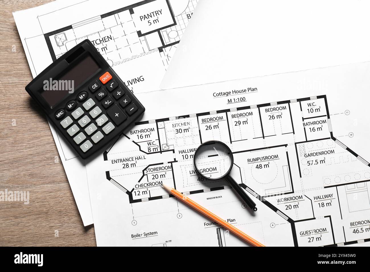 Construction drawings magnifying glass hi-res stock photography and ...