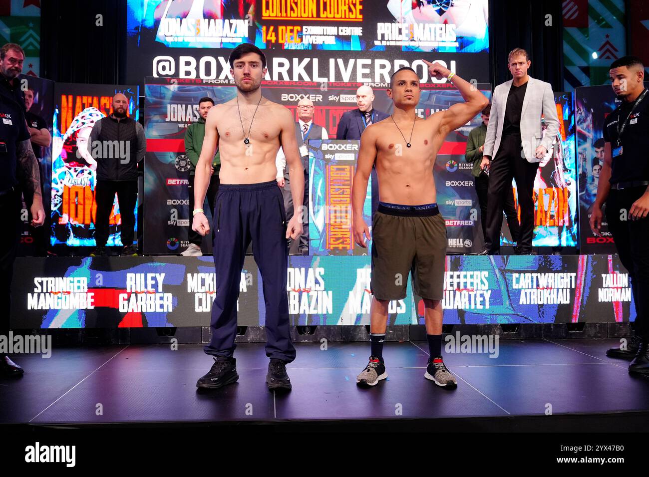 Jamie Devine and Jayro Duran (right) pose for photos during the weigh-in at BOXPARK Liverpool ...
