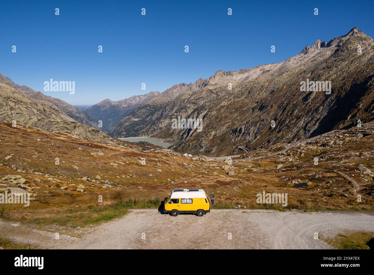Vintage yellow camper van parked on Grimsel Pass in the Alps Mountains ...