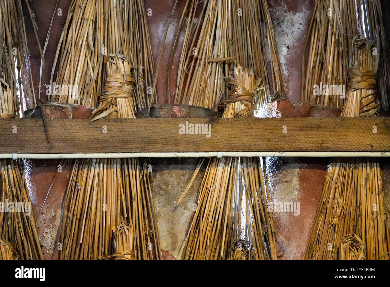 Detailed close-up of the construction of a thatched roof. Roof made of ...