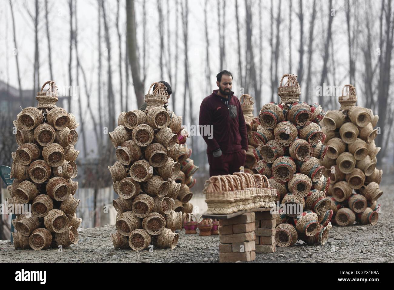 Snow in Srinagar, India An Indian Kashmiri man shops for traditional ...