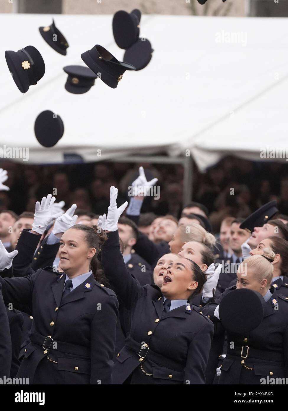 Newly Garda graduates, including Erin Donald from Derry (centre ...