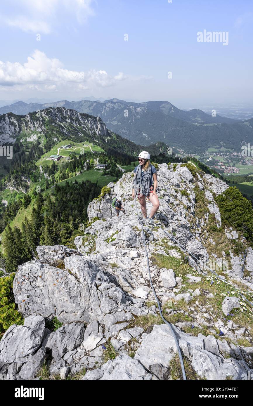 Climber with climbing rope on a climbing tour, climber on a mountain ...