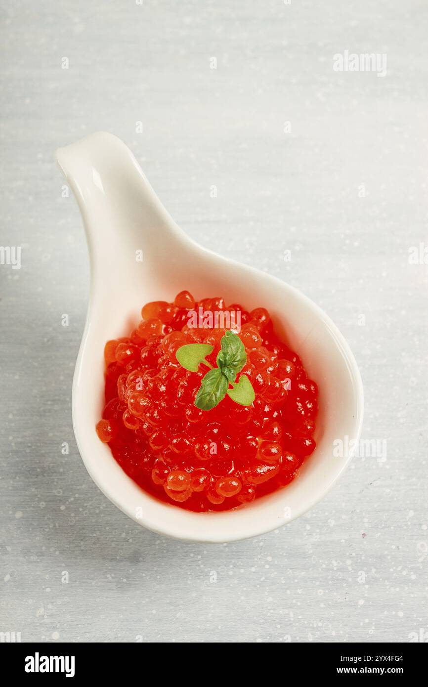 Red caviar, imitation, on a light background, close-up, no people Stock ...