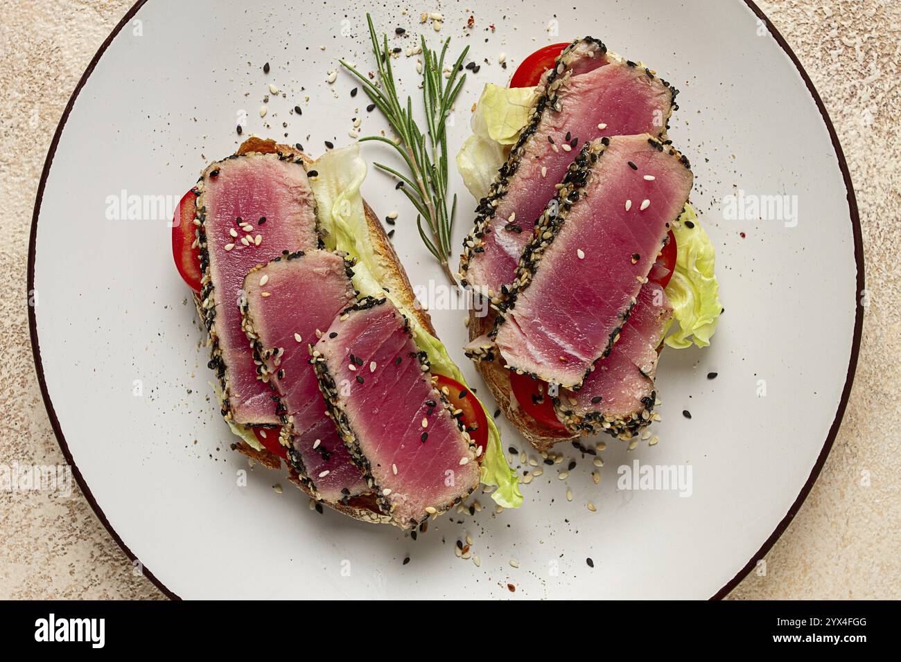 Sandwiches with fried tuna fillet, sesame, breakfast, top view ...