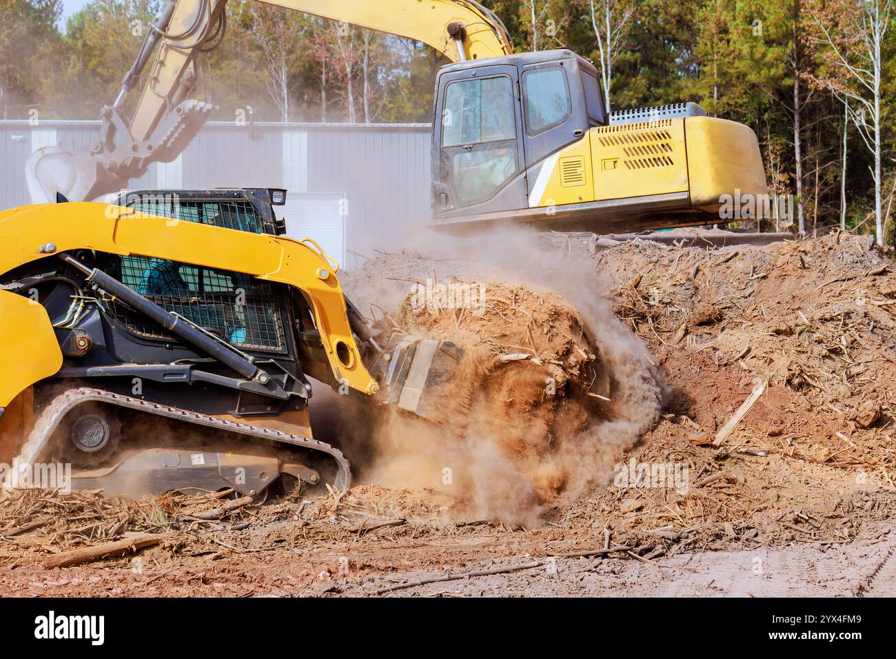 Mini excavator during earthmoving hi-res stock photography and images ...