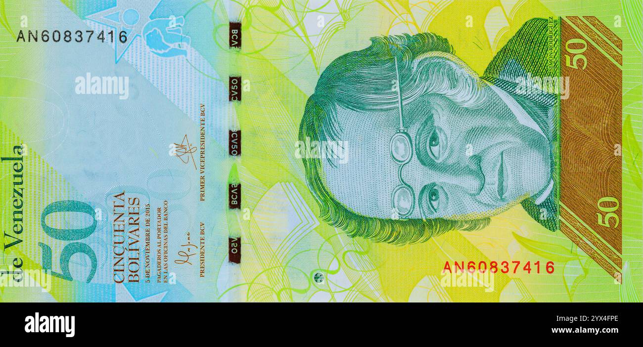 This 50 bolivar note showcases Simon Bolivar portrait along with ...