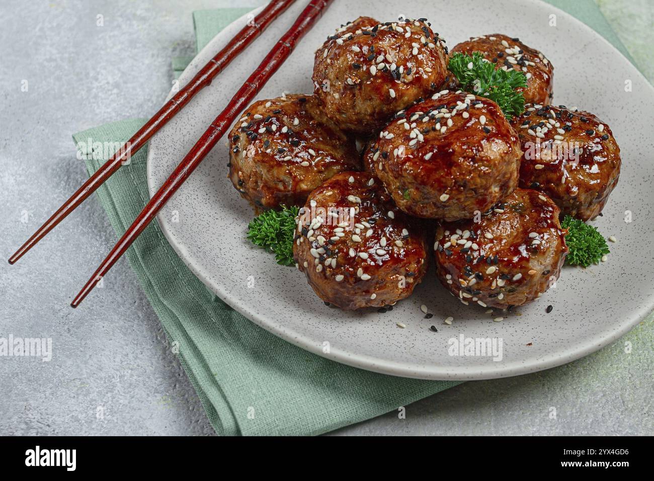 Tsukune, Japanese meatballs, minced chicken, fried on a skewer, with ...