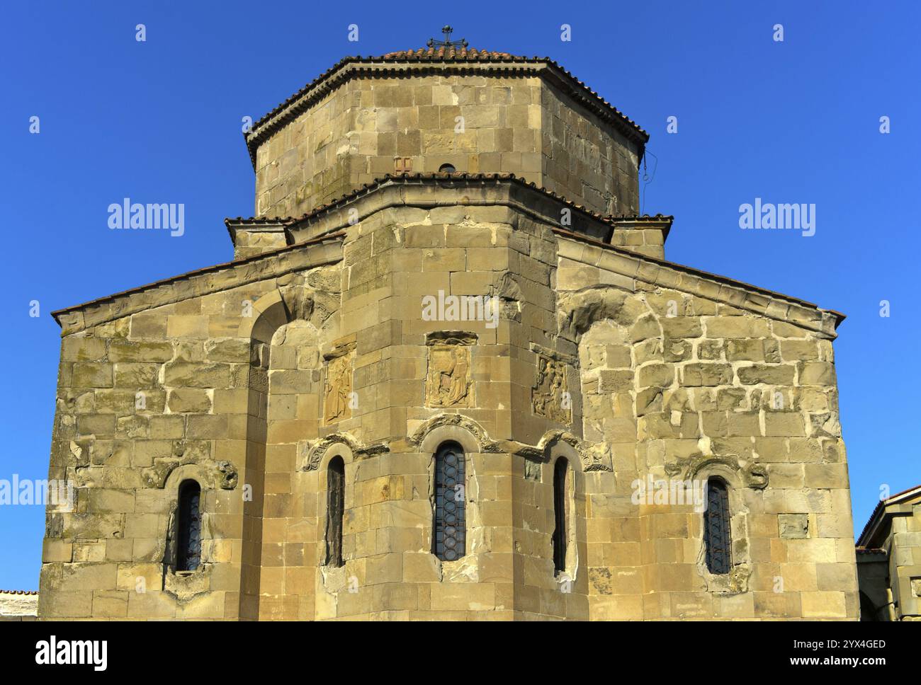 East facade of the Dzhvari Cross Church with three architectural bas ...
