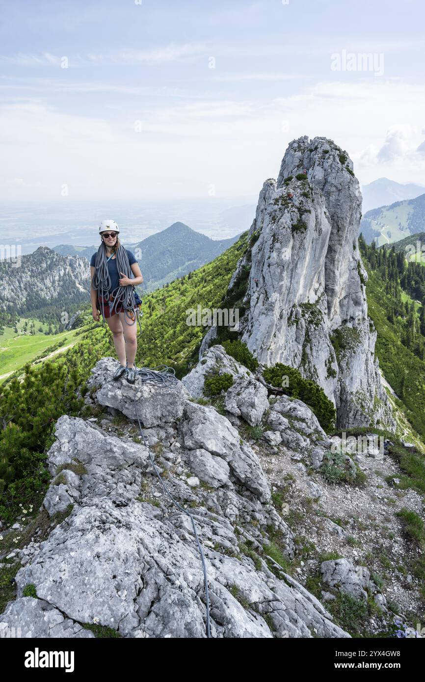 Climber with climbing rope on a climbing tour, climber on a mountain ...