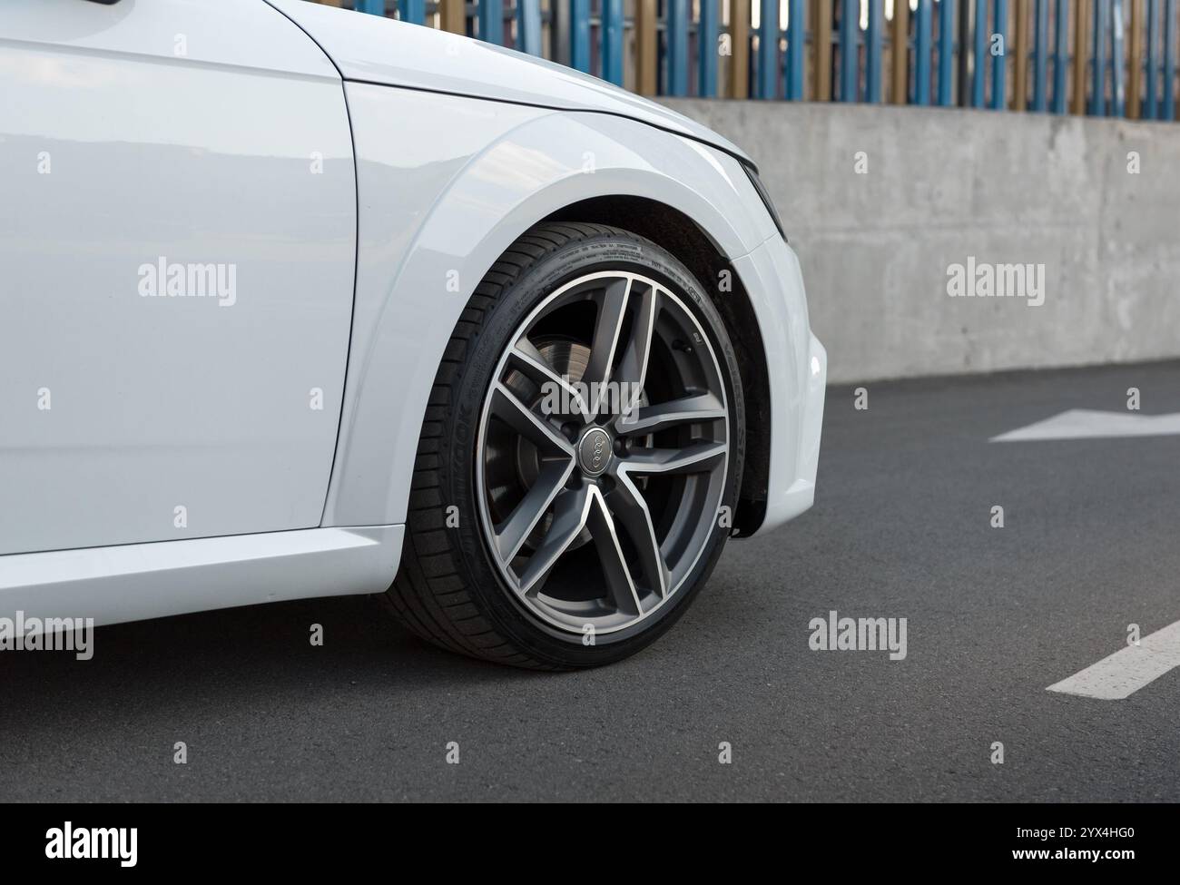 Front fender view of performance version of Audi TT coupe. White Audi ...