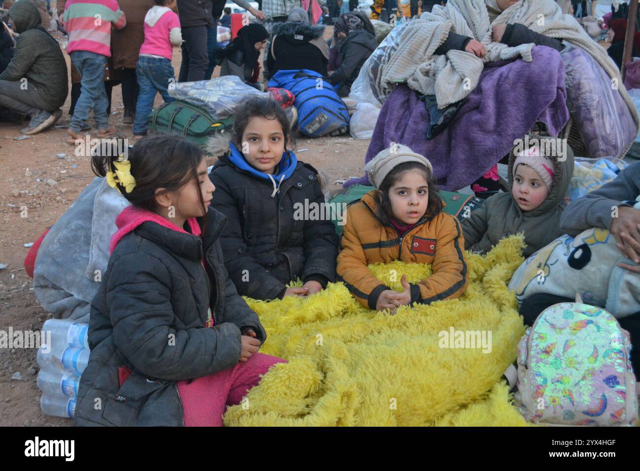 Masnaa. 12th Dec, 2024. Syrians fleeing Syria are stuck at the border ...