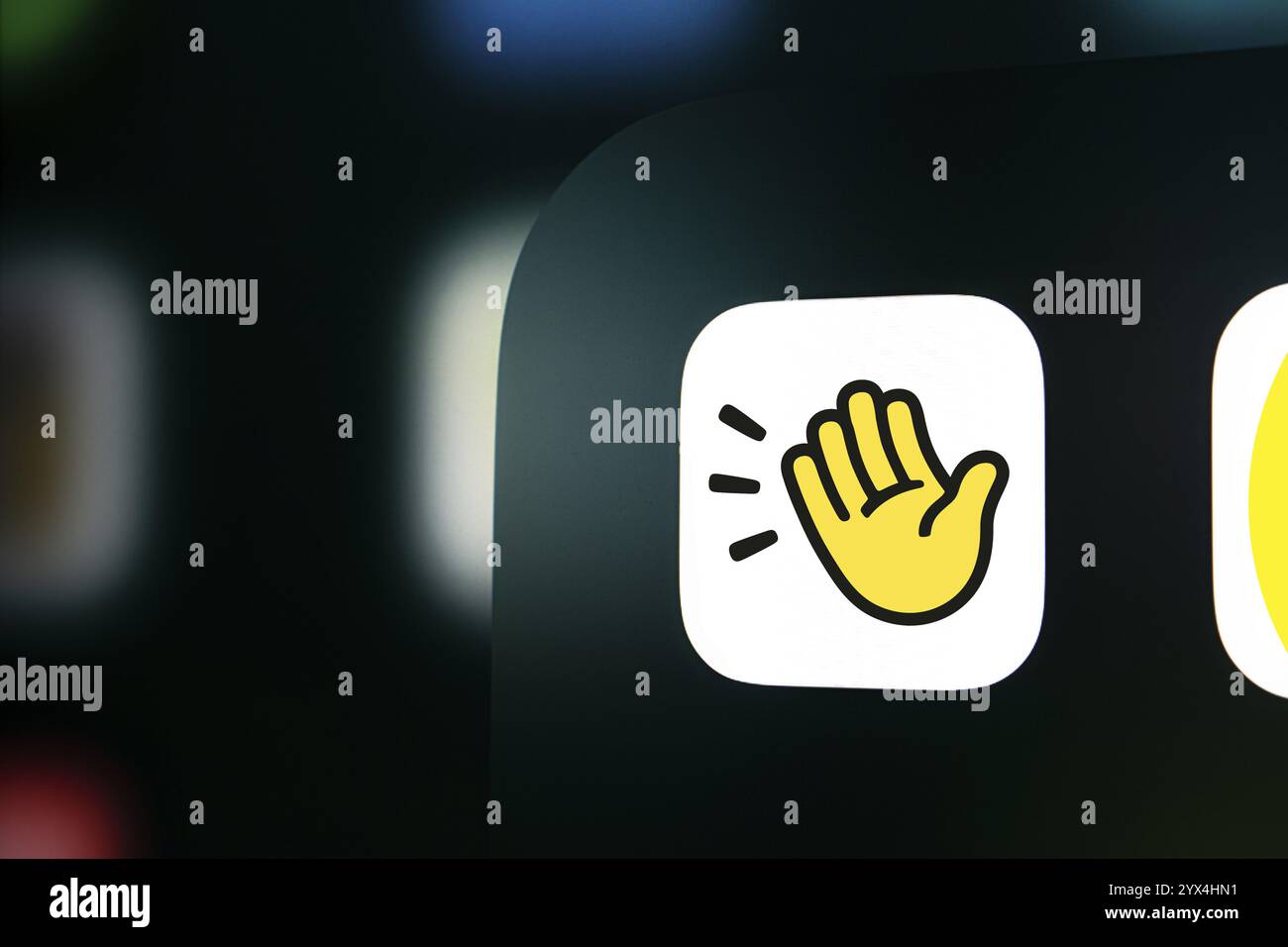 A close up of an smartphone screen displaying the clubhouse app icon ...