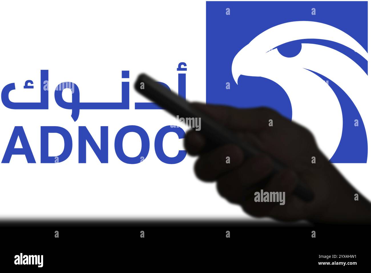 Abu Dhabi National Oil Company (ADNOC) on smartphone Stock Photo - Alamy