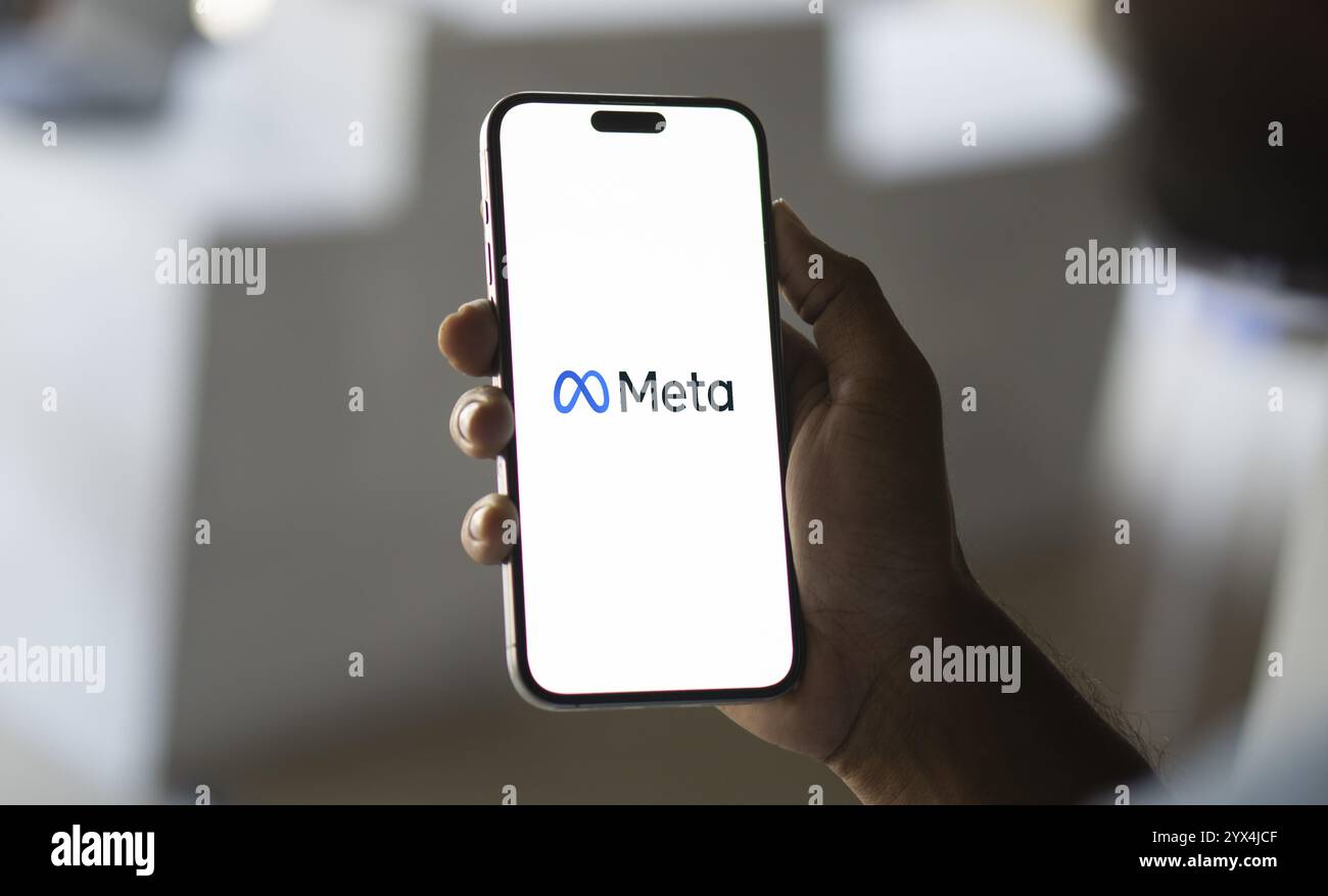 Meta logo on smartphone screen. Meta is the new name of the company ...