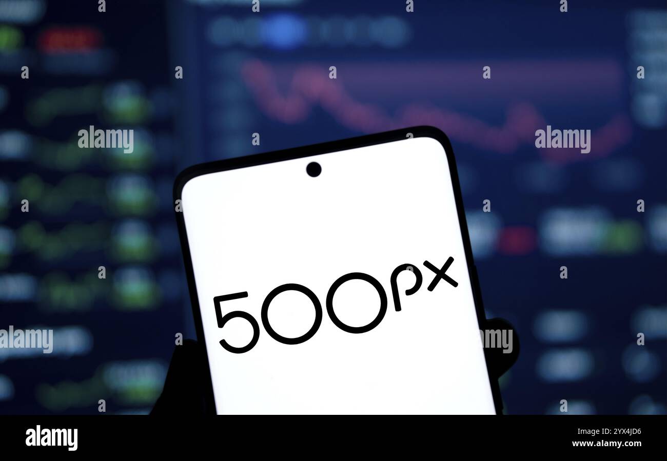 500px logo is displayed on smartphone.500px is a global online photo ...
