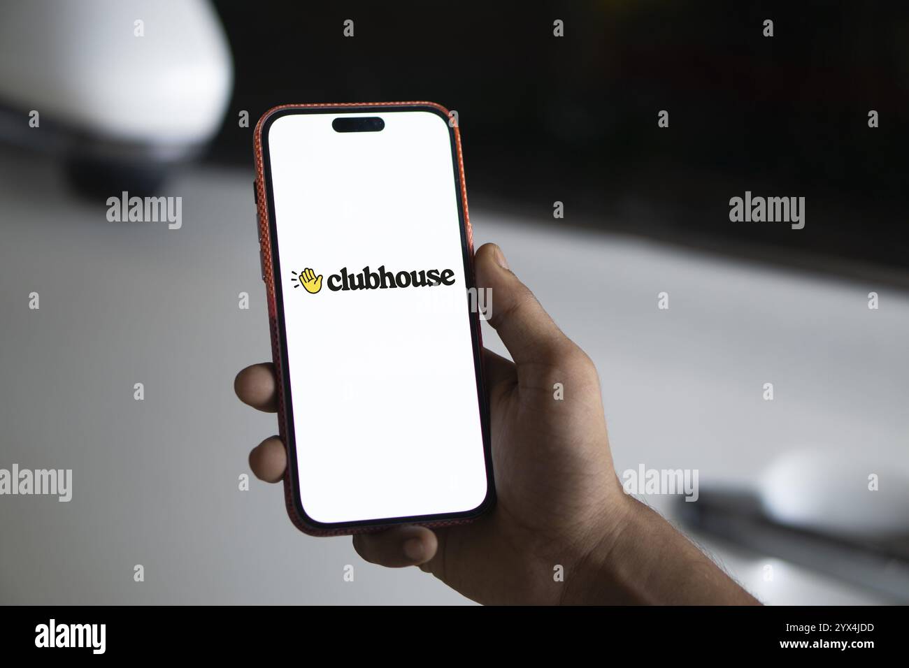 Clubhouse logo is displayed on smartphone. Clubhouse is a social audio ...