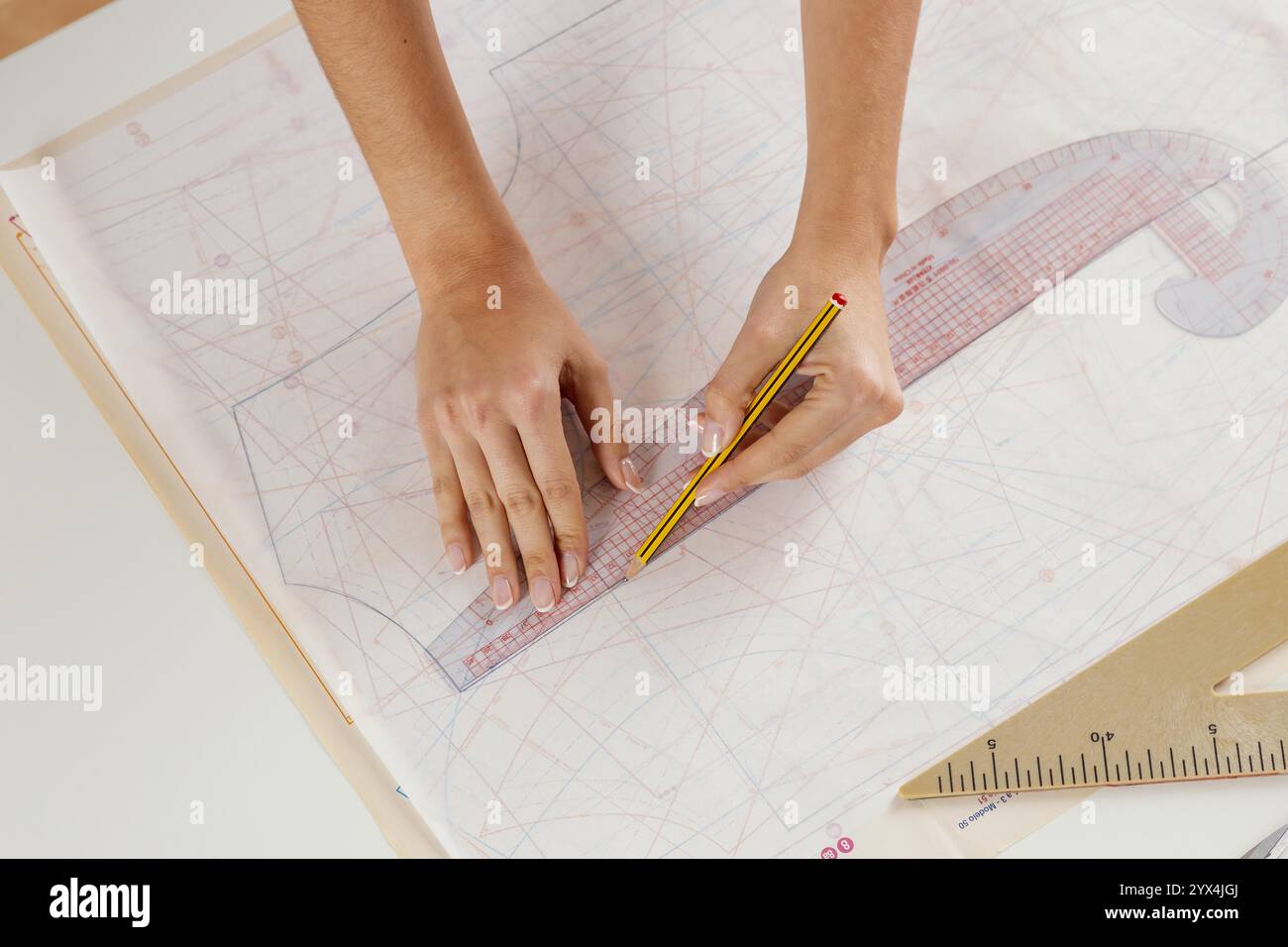 Woman measuring with ruler close up Stock Photo - Alamy