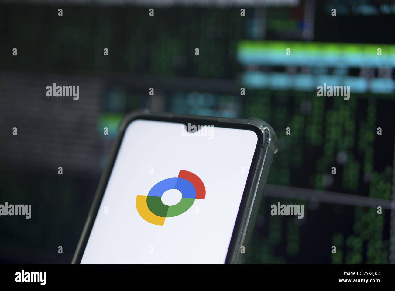 Google find my device logo is displayed on smartphone and background ...
