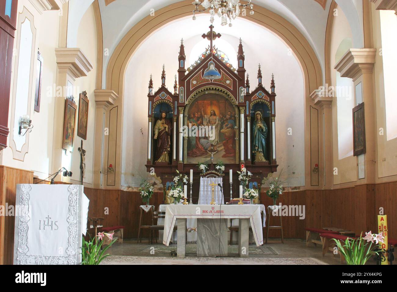 The main altar in the parish church of Saint Thomas the Apostle in ...
