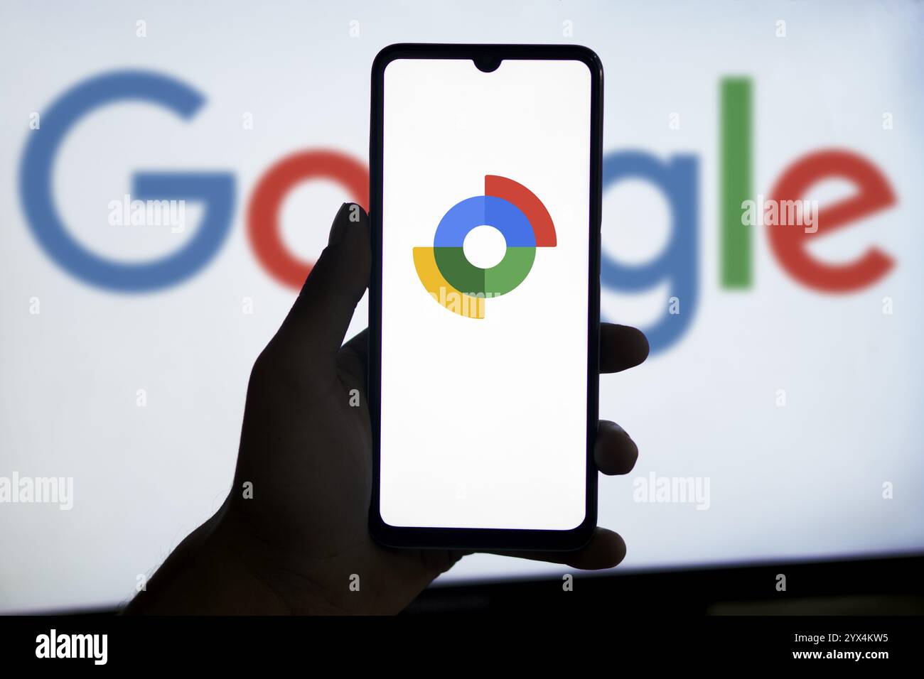 Google find my device logo is displayed on smartphone and background ...