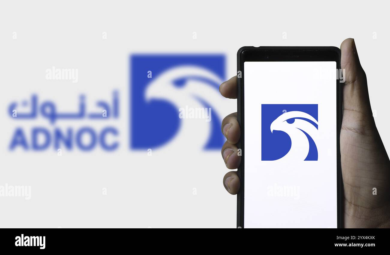 Abu Dhabi National Oil Company (ADNOC) on smartphone Stock Photo - Alamy