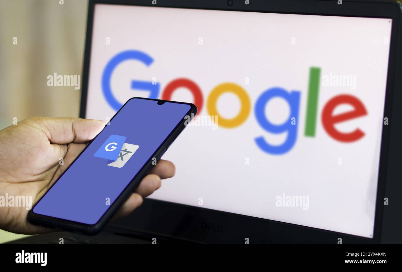 Google translator logo on smartphone google logo on background screen ...